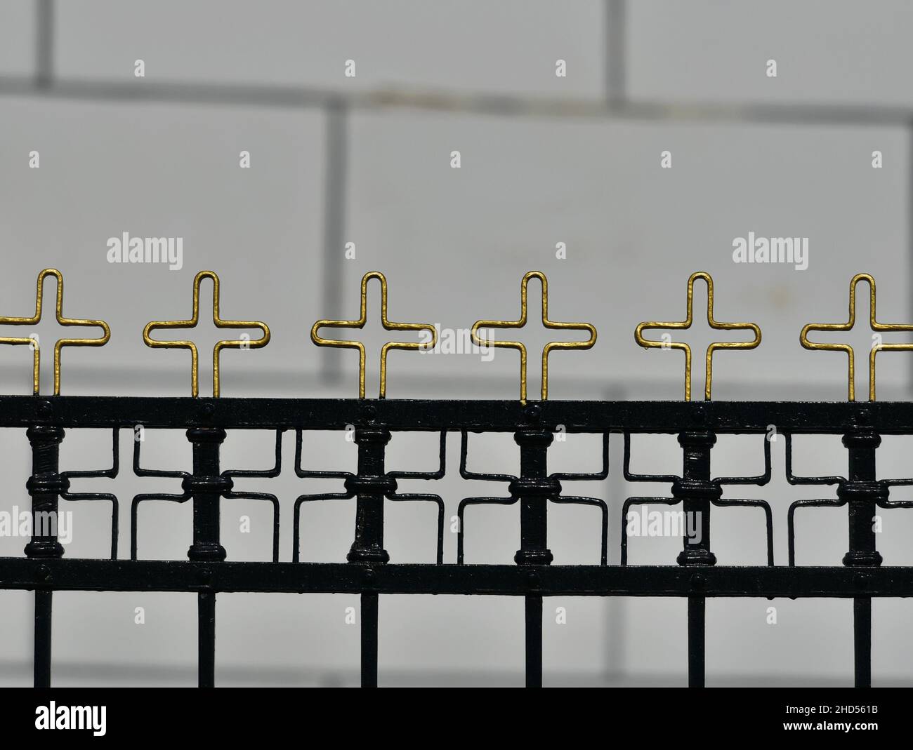 Traditional handcrafted wrought iron fence railing with religious ...