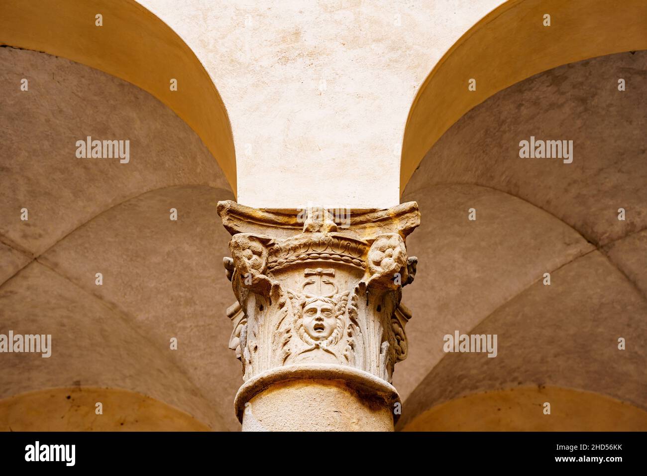 Fragment of the upper part of the column under the vaulted ceiling with ...