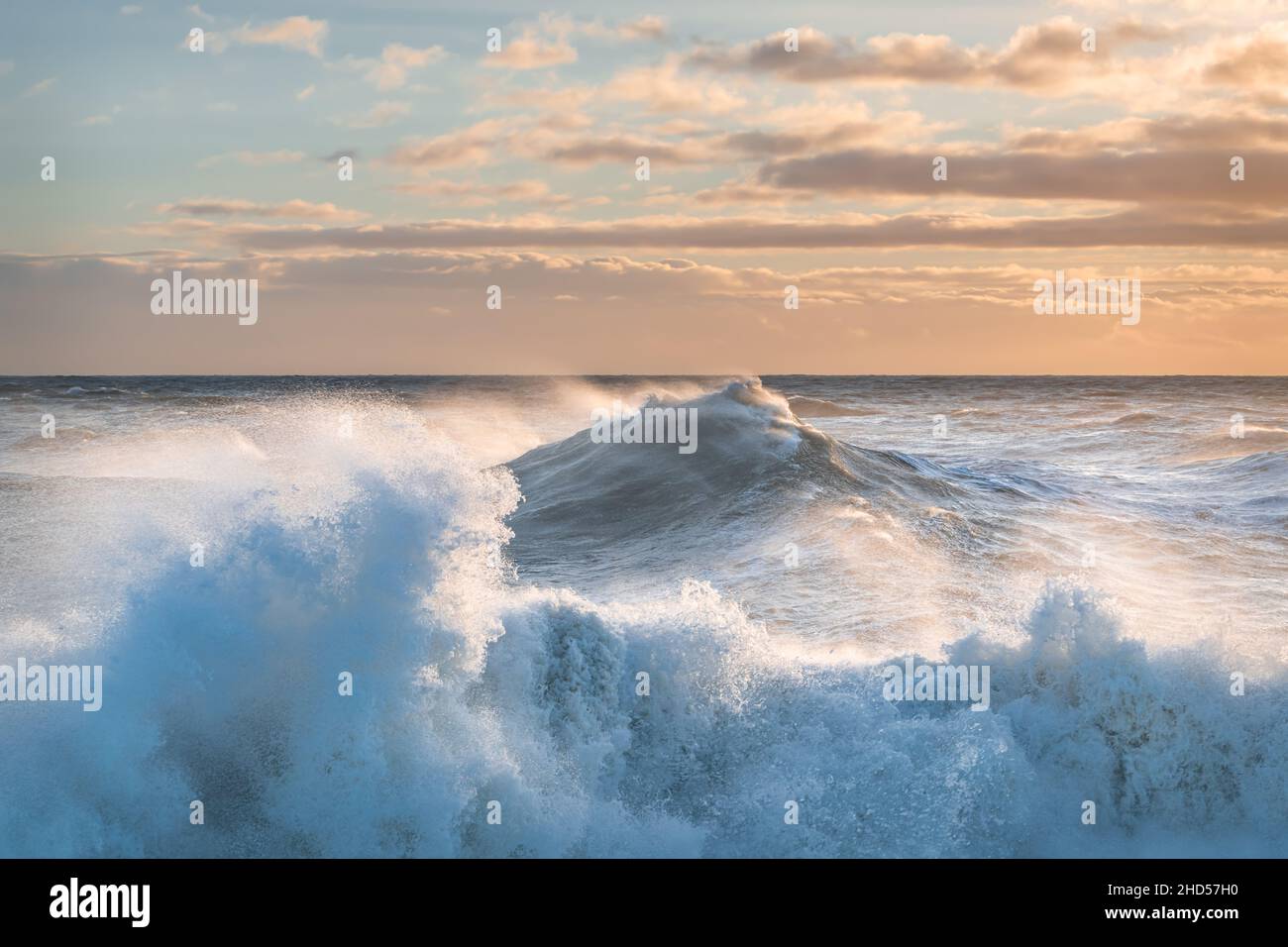 Rough Waves at Sunset during a storm in the English Channel Stock Photo ...