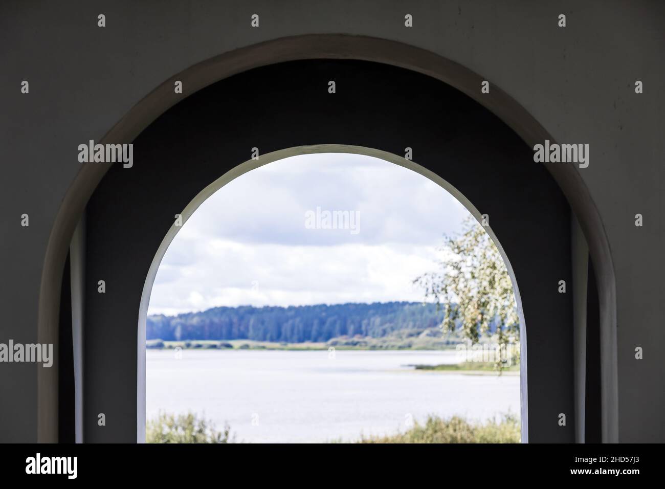 Abstract architectural background photo with summer landscape behind ...