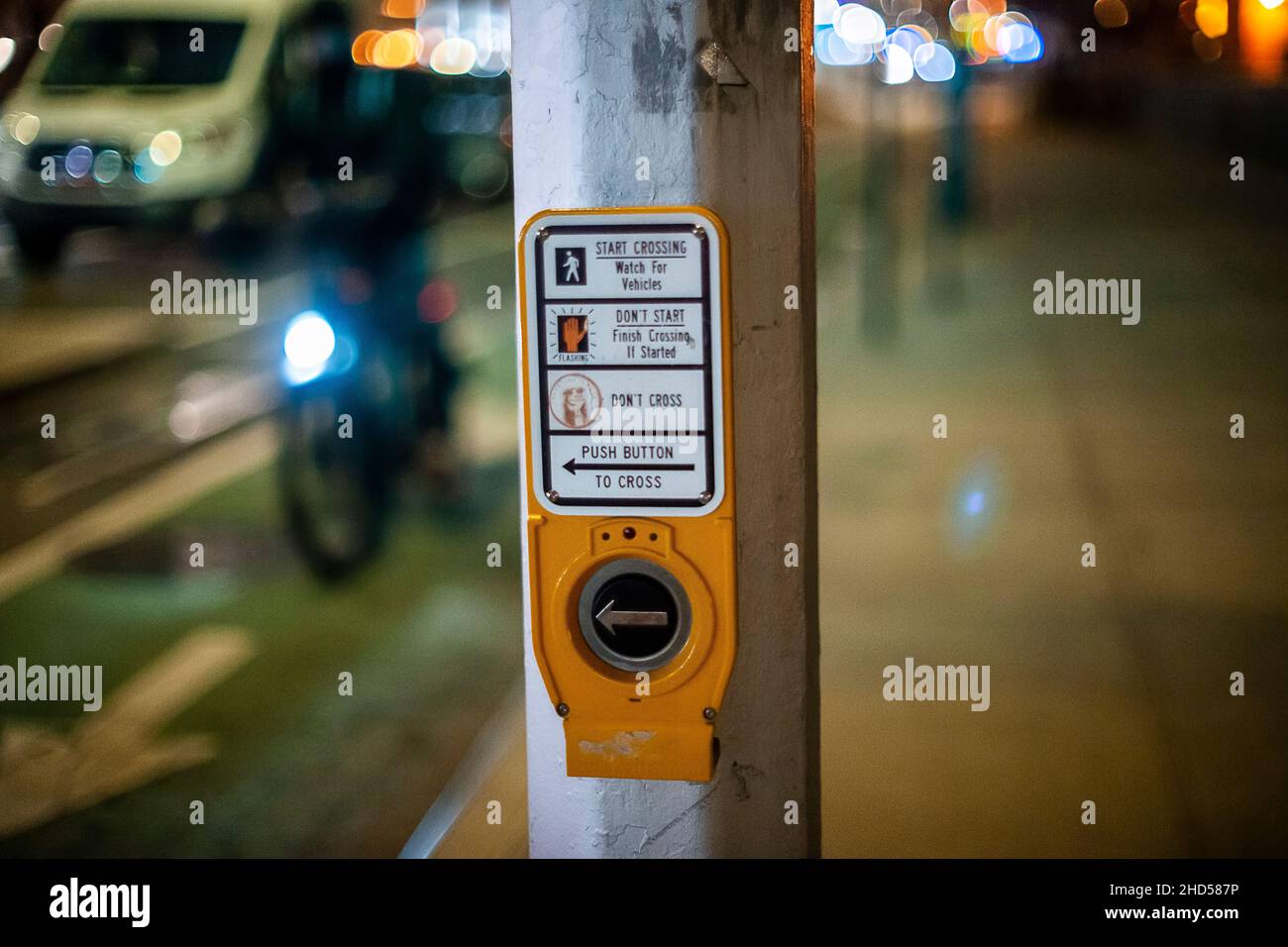 An audible crosswalk signal attached to a light pole is seen in Chelsea ...