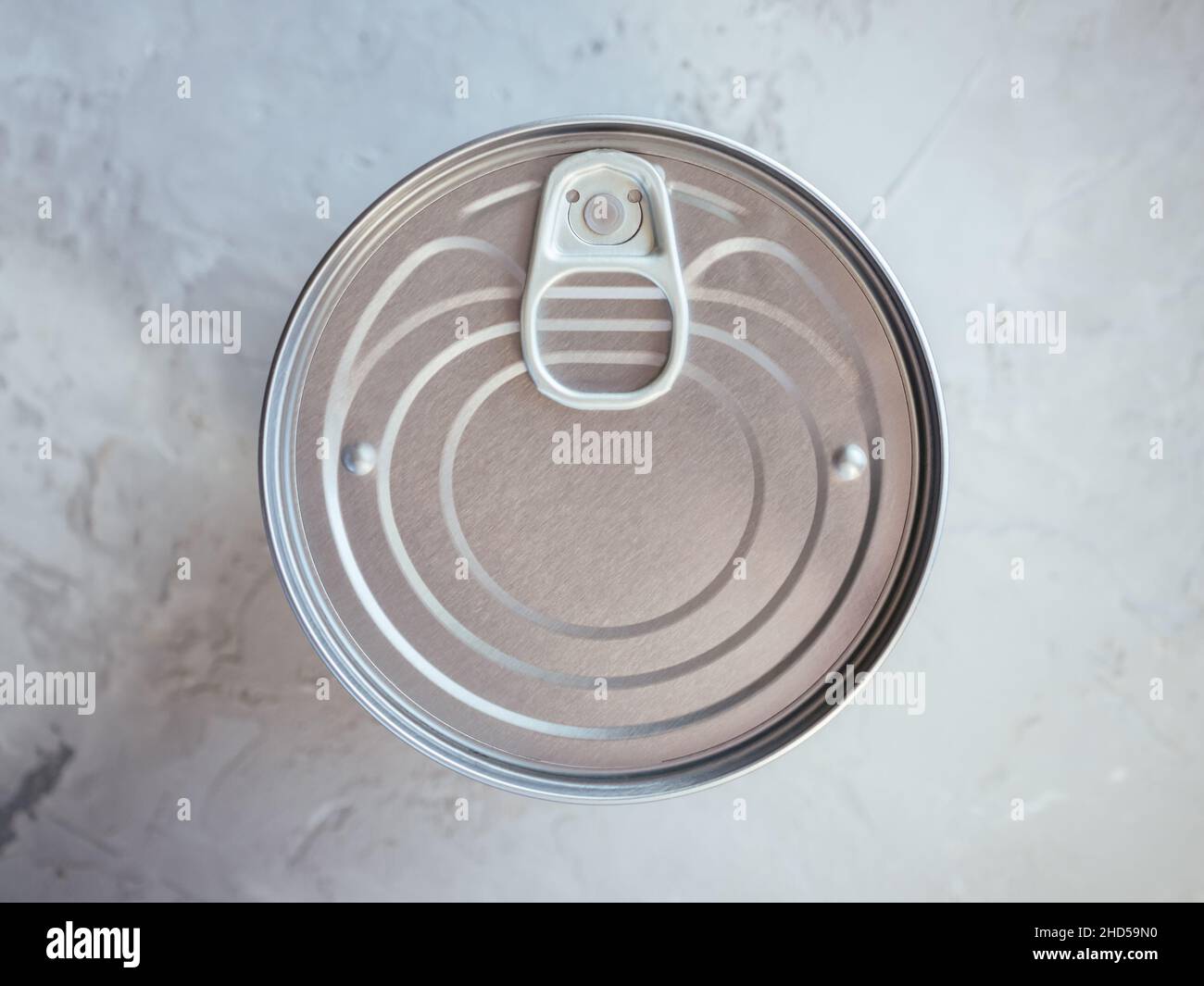 Canned foods in tin can on concrete grey background. Non-perishable ...