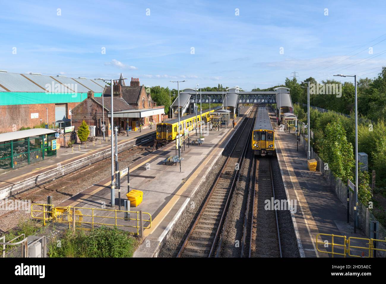 Merseyrail class 507 electric trains at the 4 platform Hooton railway ...