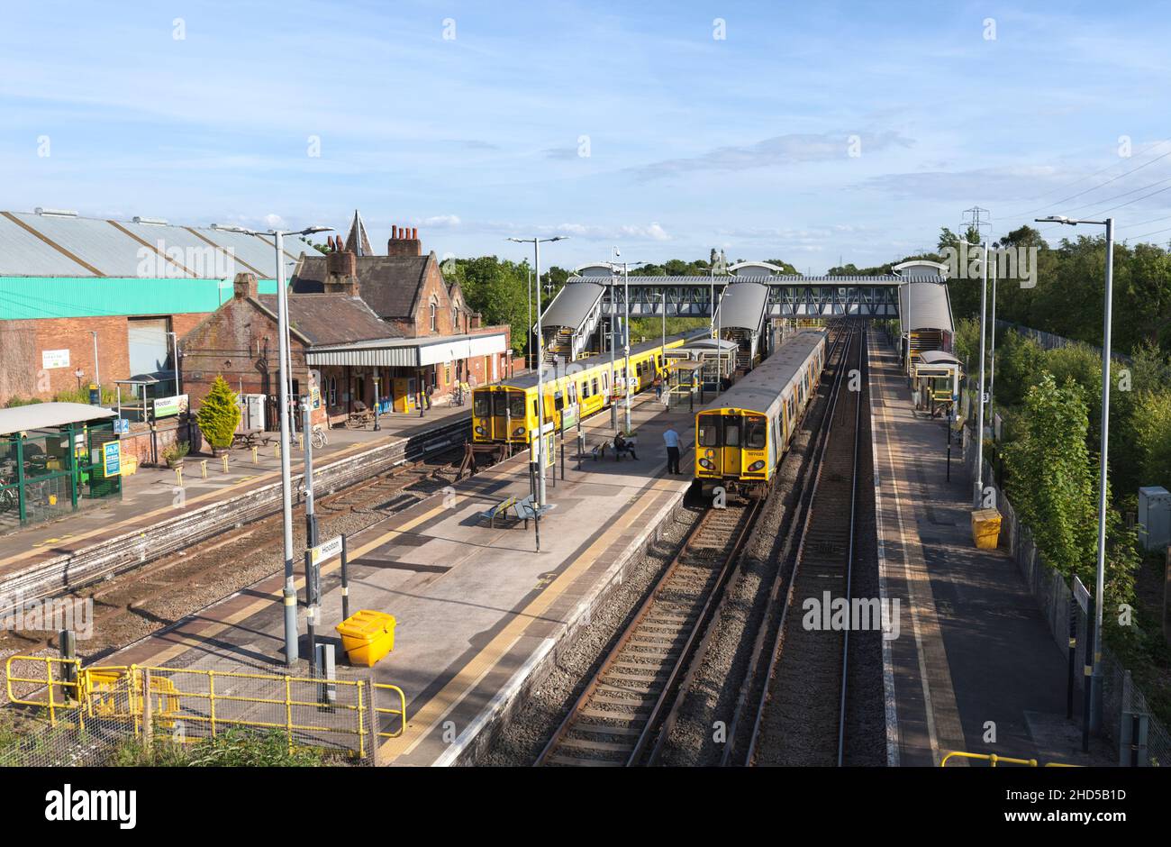 Merseyrail class 507 electric trains at the 4 platform Hooton railway ...