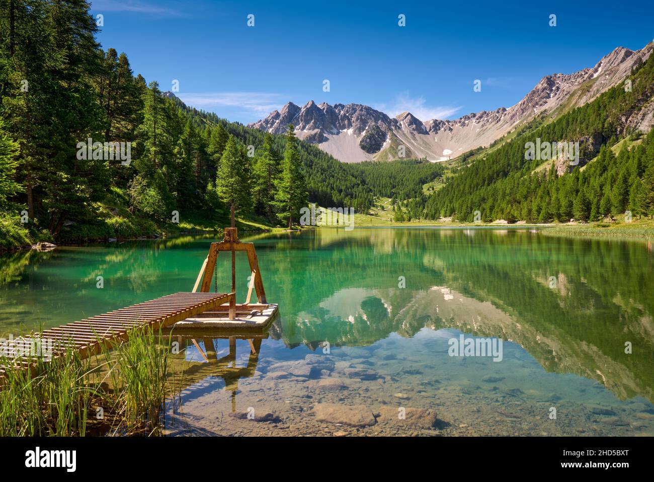 Orceyrette Lake in Summer with larch tree forest. Briancon Region in ...