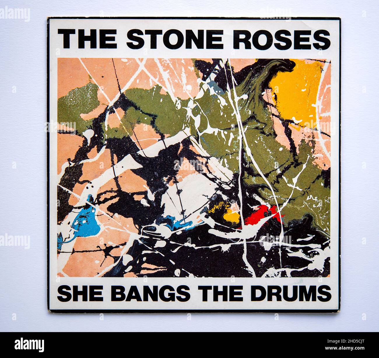 Picture cover of the seven inch single version of She Bangs the Drums by Manchester band The ...