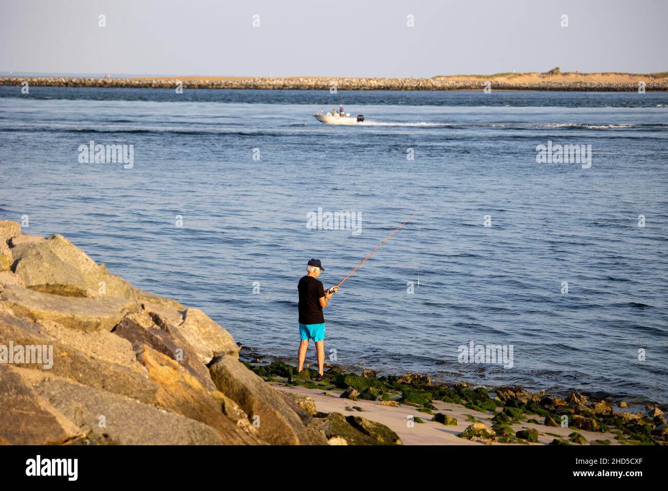 Elderly man fishing on ocean hi-res stock photography and images - Alamy