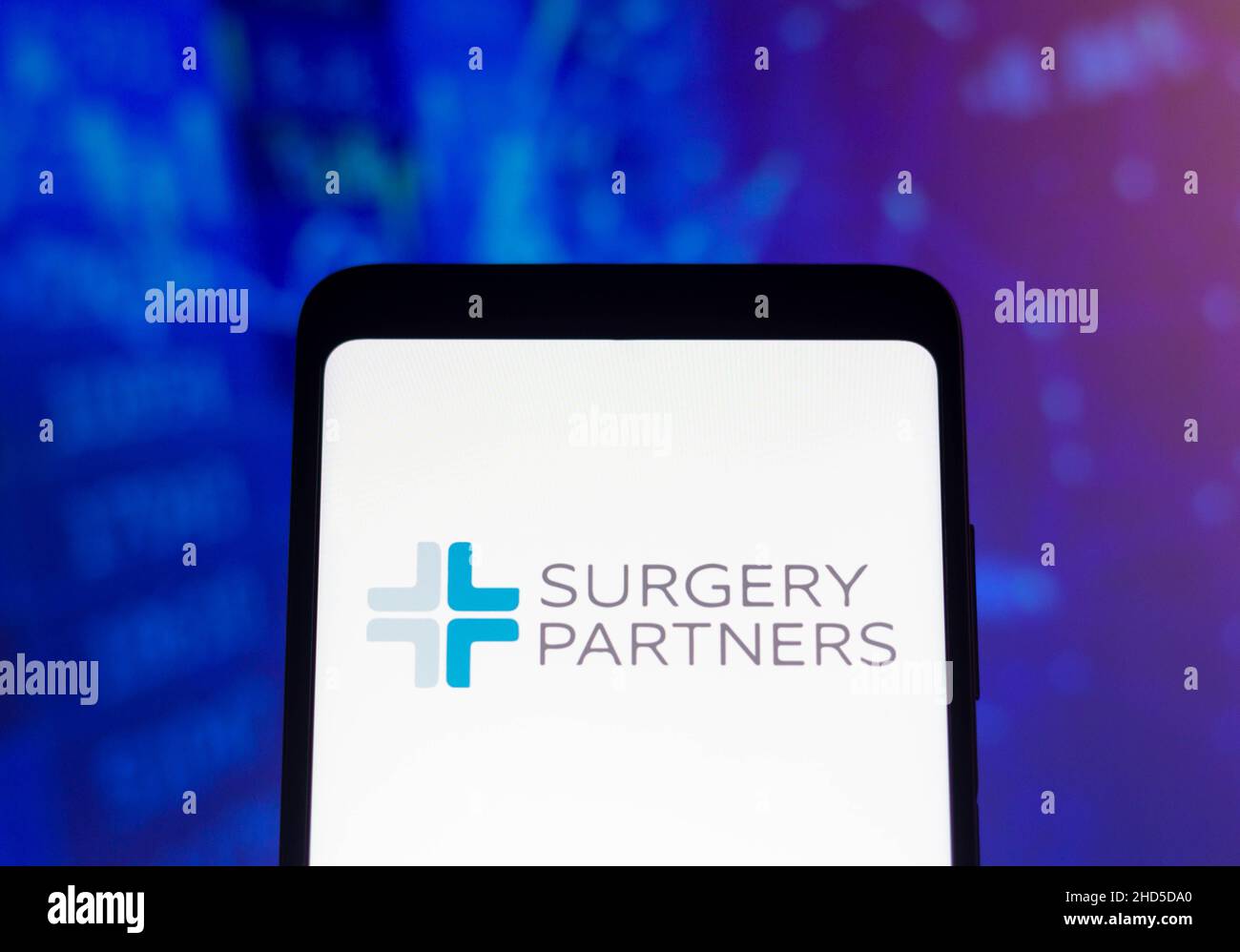 In this photo illustration, the Surgery Partners logo seen displayed on ...