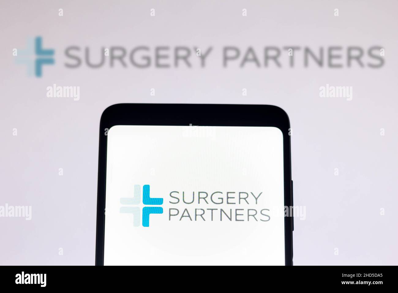 In this photo illustration, the Surgery Partners logo seen displayed on ...