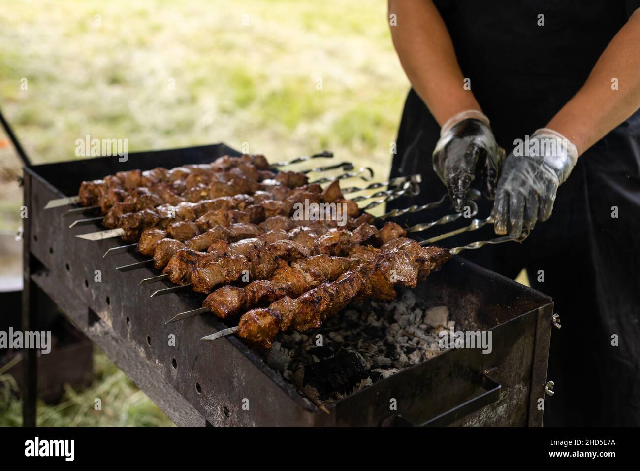 delicious bbq kebab grilling on open grill, outdoor kitchen. food ...