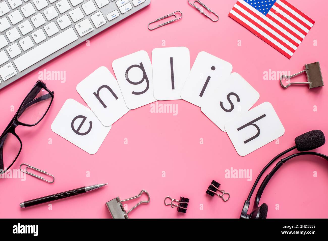 Learning English language concept. Text on student table desk, top view ...