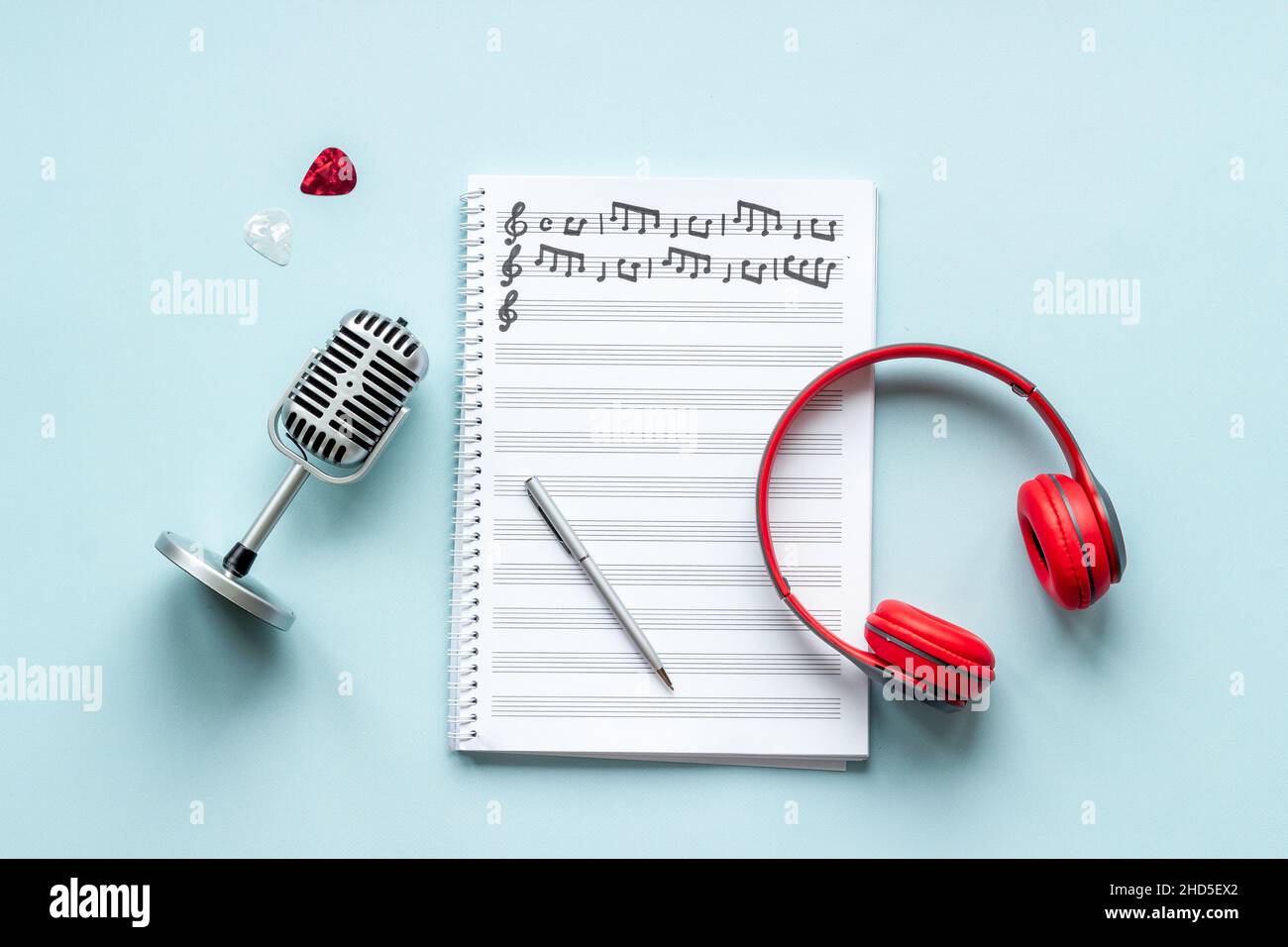 Composer table with music sheets and microphone, top view Stock Photo ...