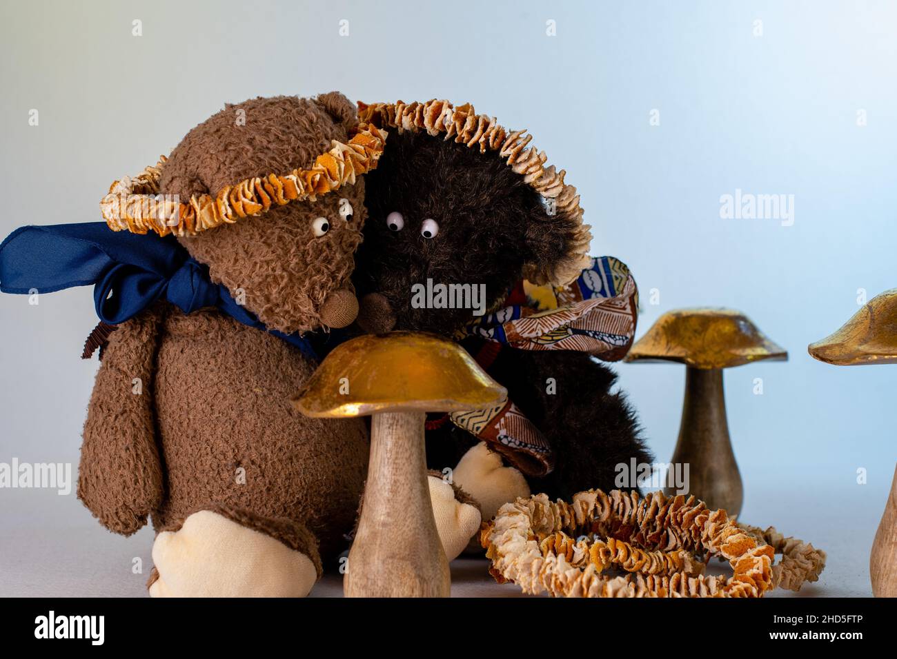 Teddy Teddybears with golden wooden mushrooms Stock Photo - Alamy