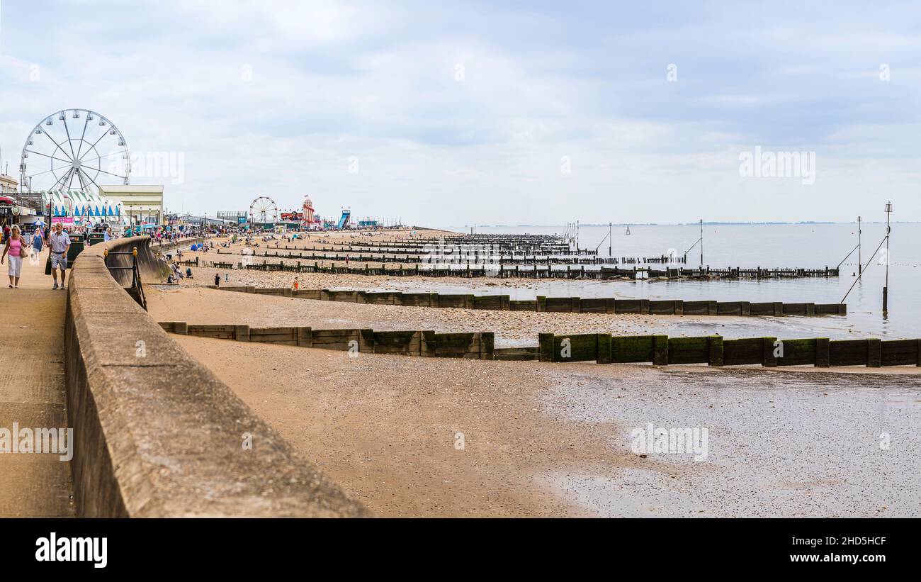 Distinctive sea front at Hunstanton made up of golden sand with wooden ...