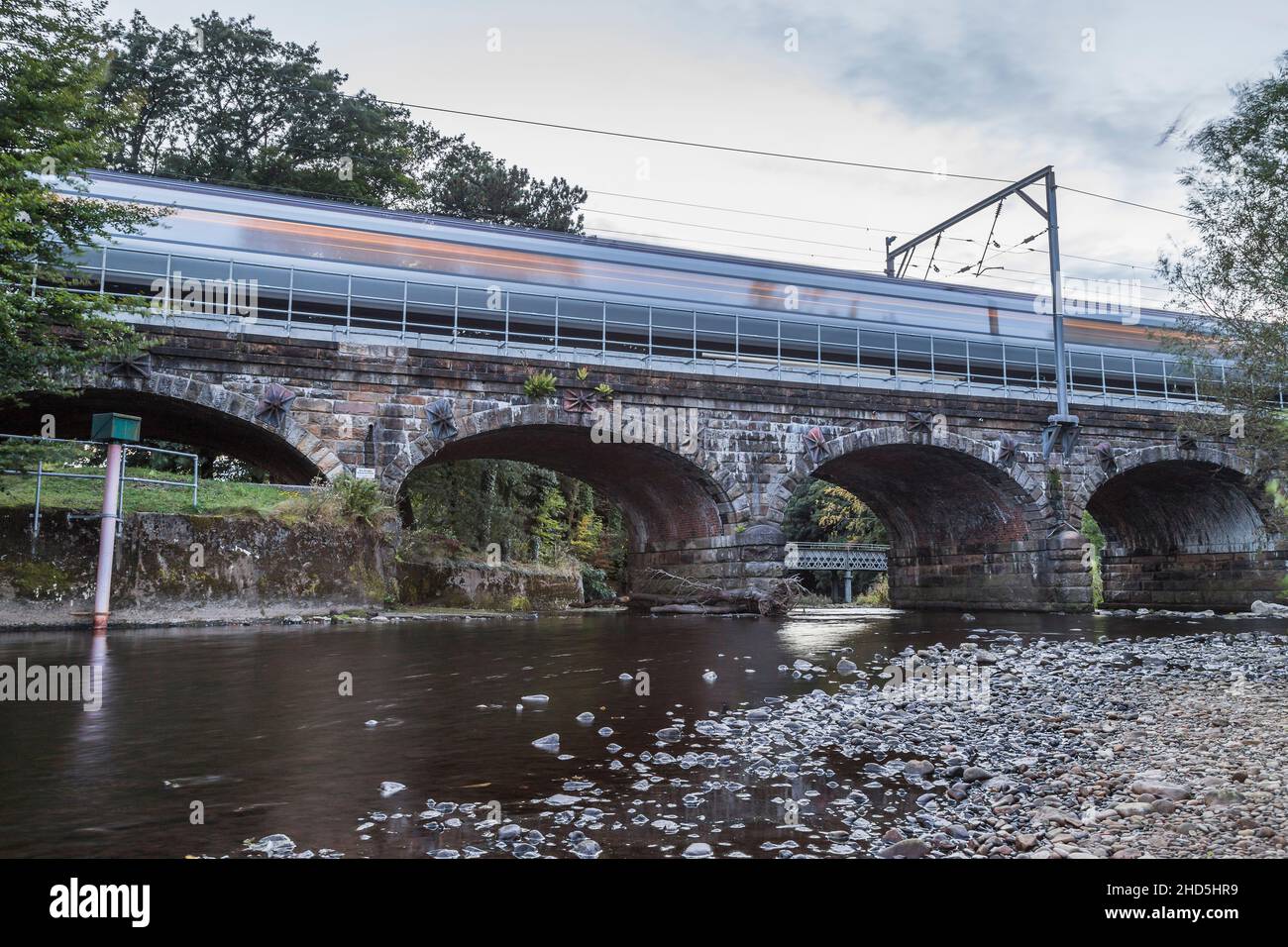 High speed train over the Six Arches bridge Stock Photo - Alamy