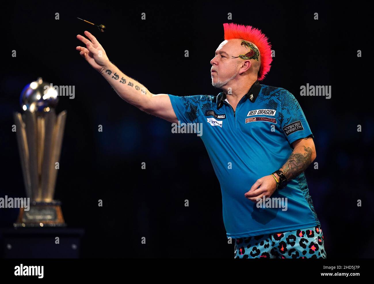 Peter Wright in action against Michael Smith during day sixteen of the ...