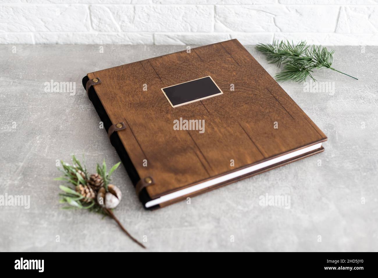photo book with wooden cover. unfolded photobook. sample photobook ...