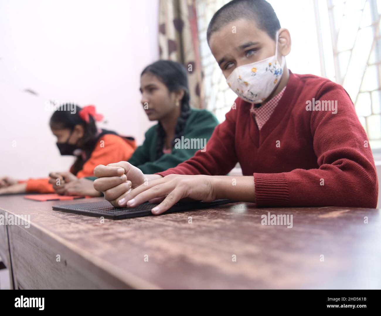 Agartala. Tripura, India. 3rd January 2022. Blind students are writing ...