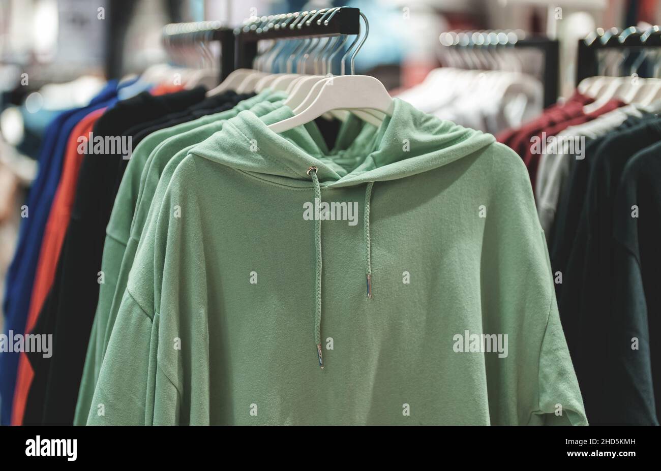 Hoodie collection in a clothing store Stock Photo - Alamy