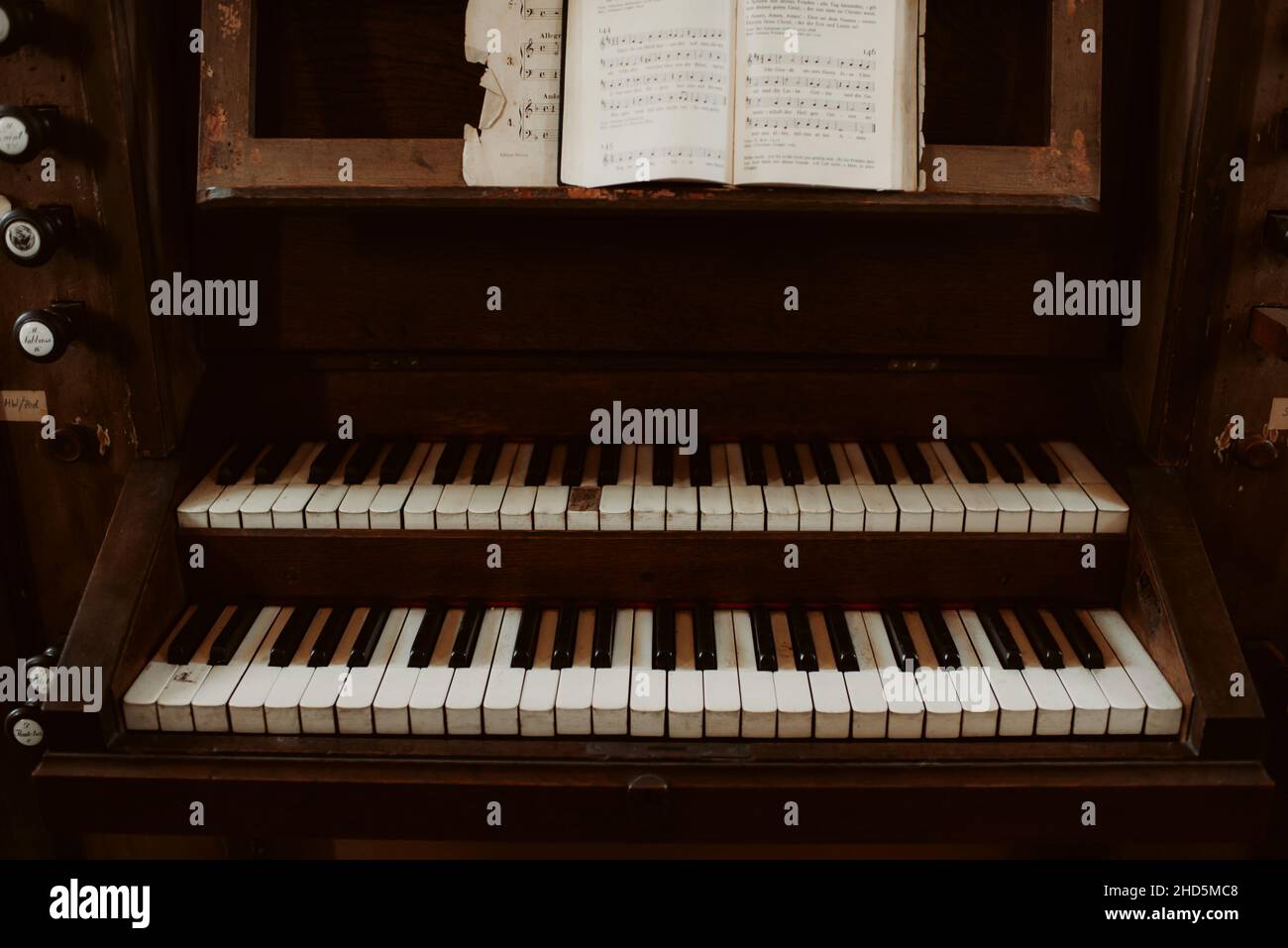 Piano with notes in a church Stock Photo - Alamy