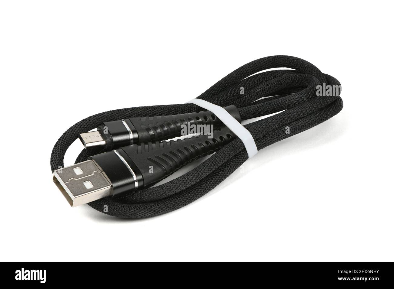 Black USB cable for charging a smartphone isolated on white. High ...
