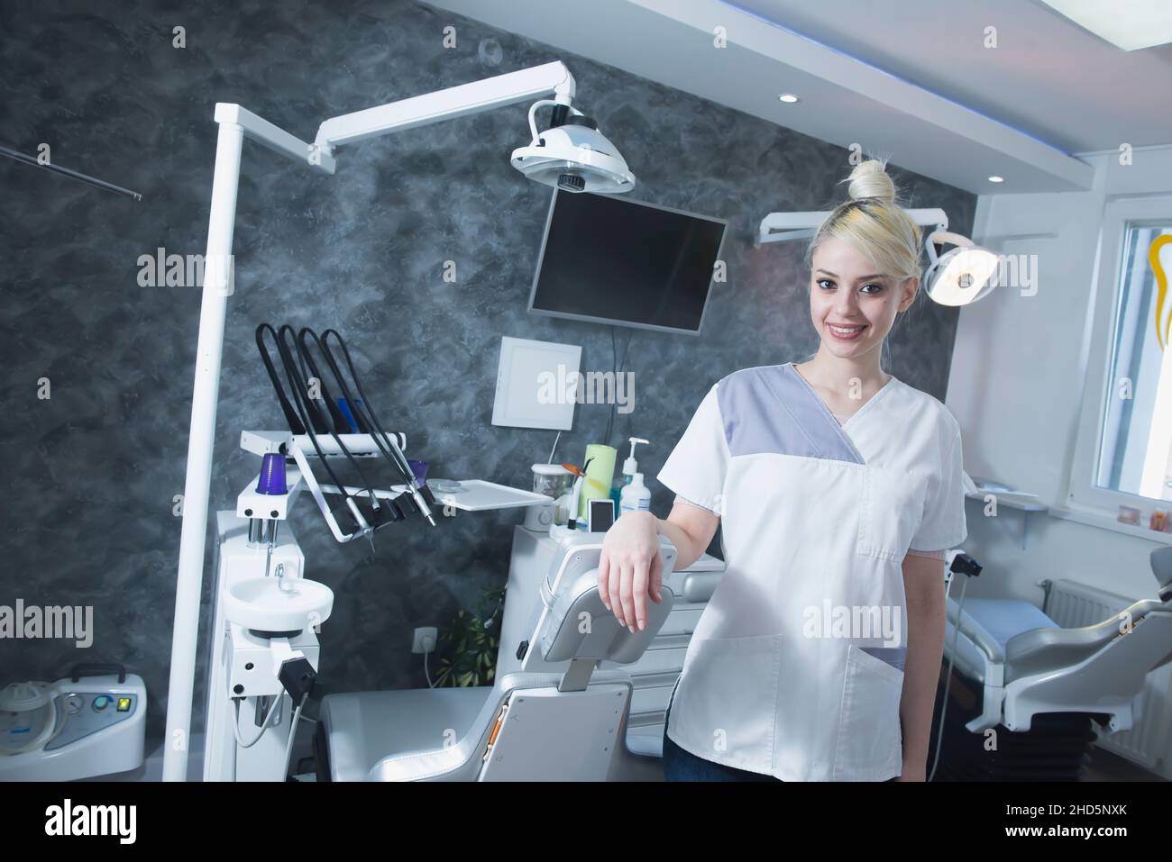 Beautiful young smiling doctor dentist hi-res stock photography and ...