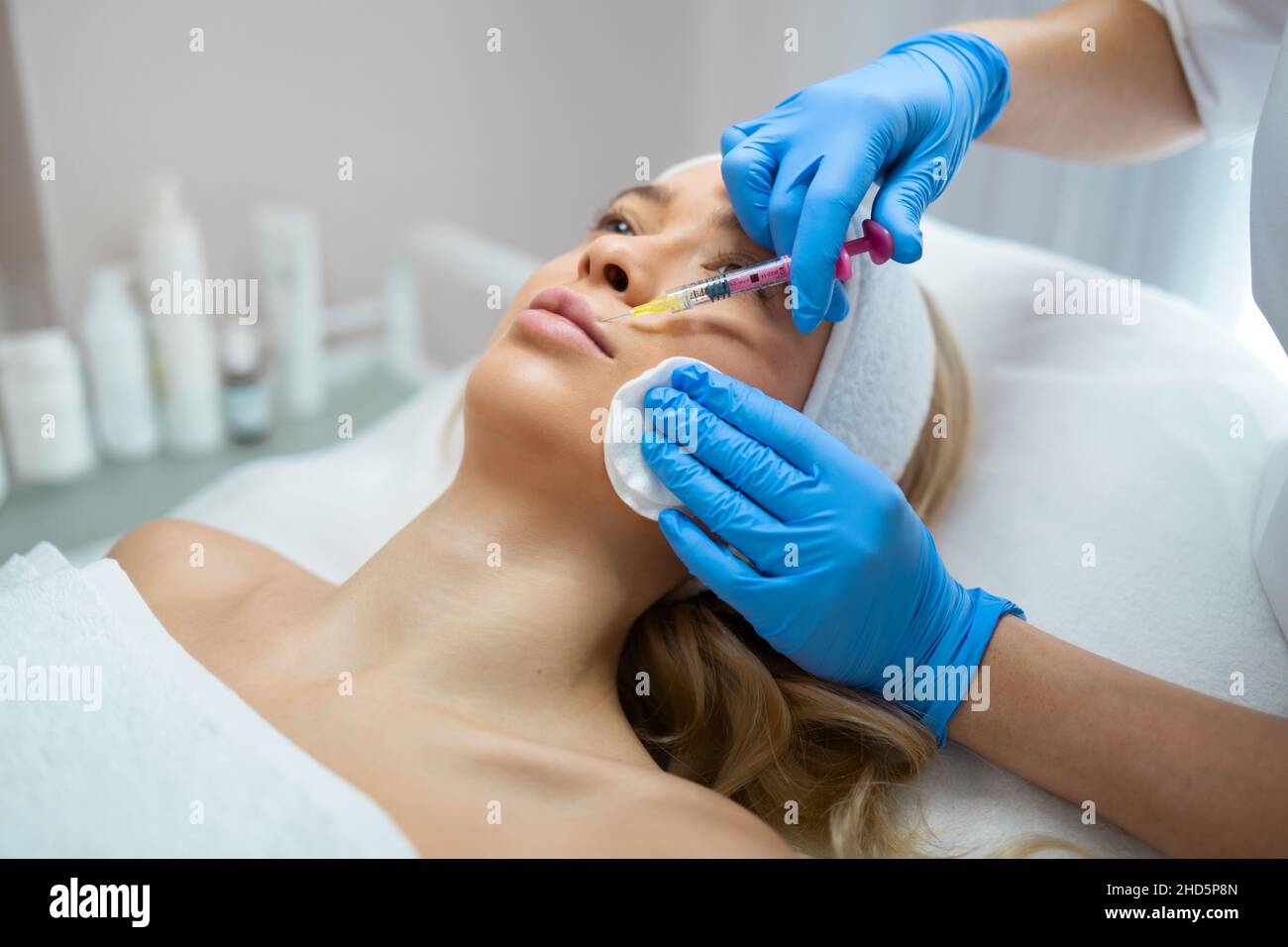 Lip augmentation procedure. Woman getting beauty injection for lips ...