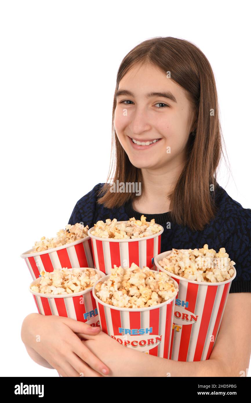 Portrait Of A Beautiful Girl Holding Bucket Of Popcorn Standing On