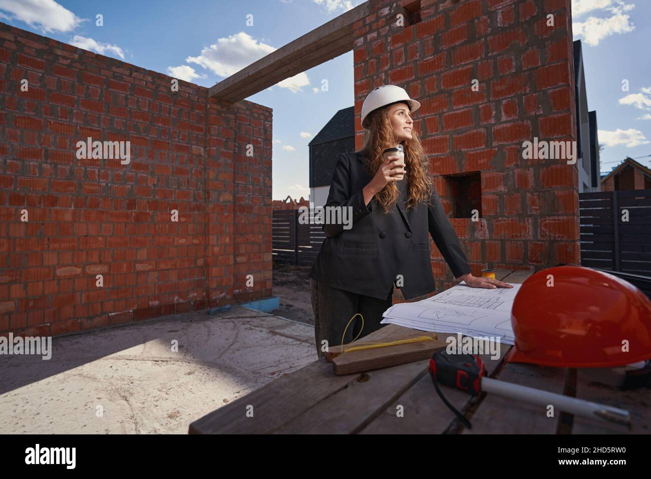 Construction drinking coffee construction site hi-res stock photography ...