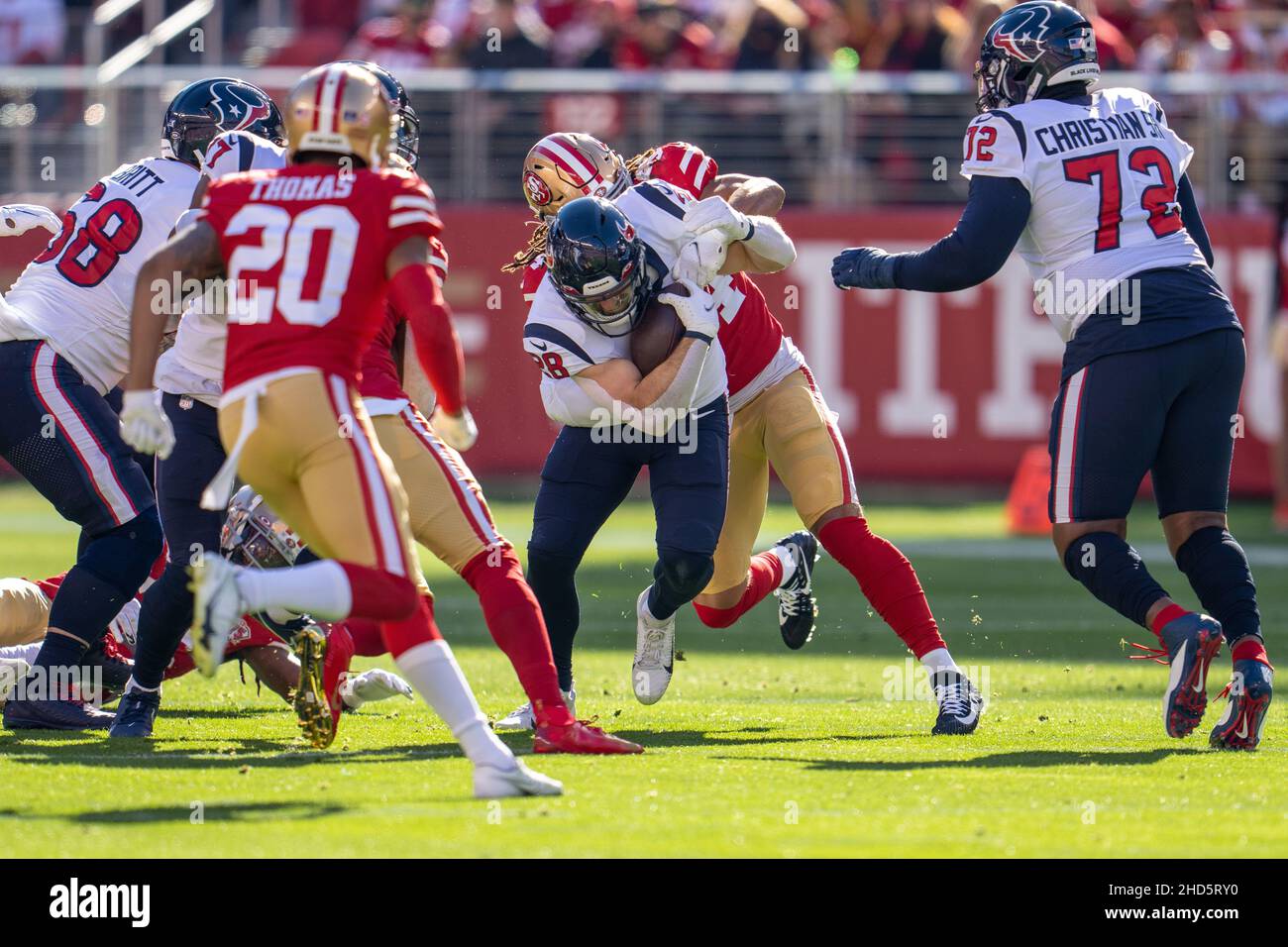 San Francisco 49ers middle linebacker Fred Warner (54) tackles Houston ...