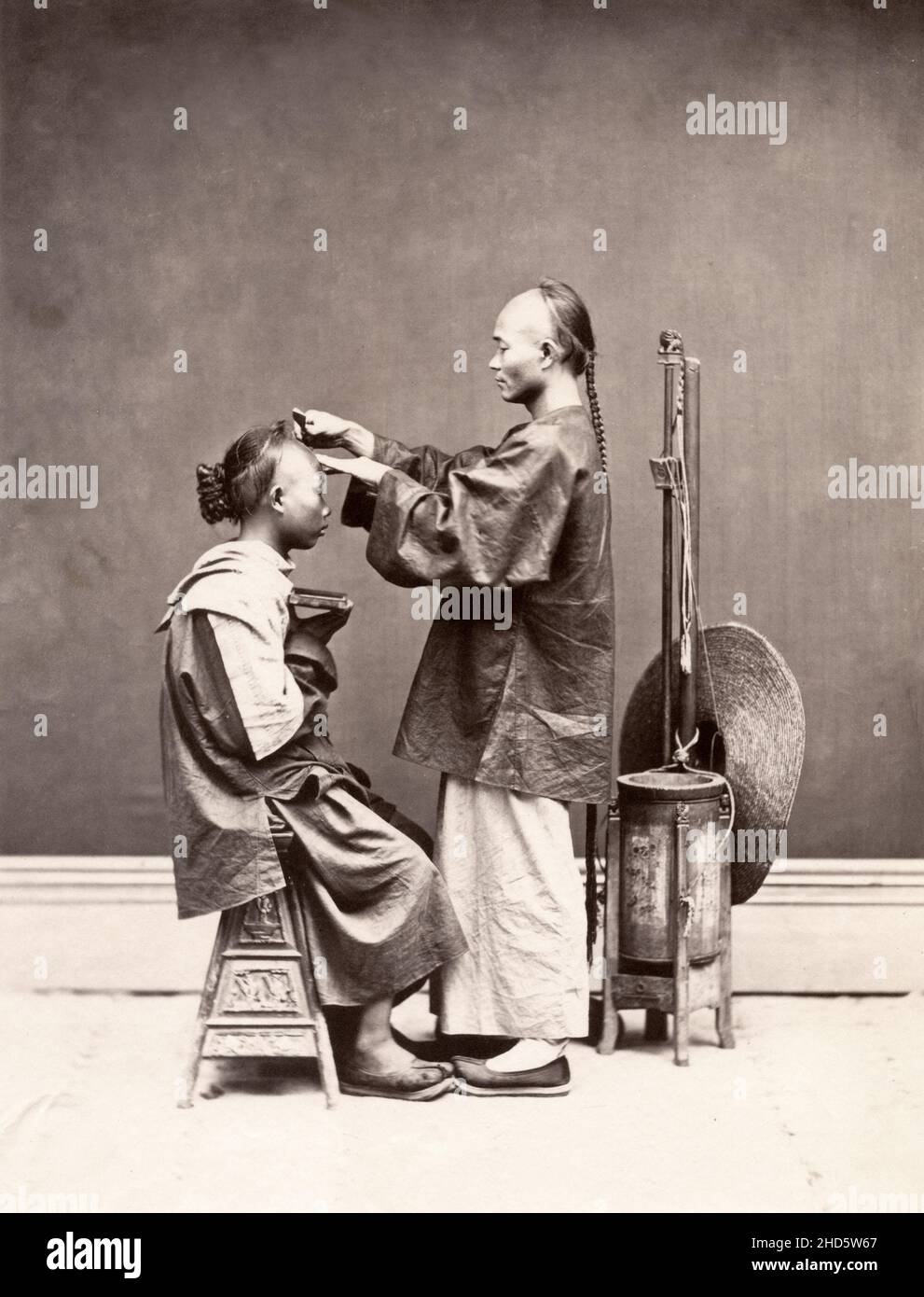 Vintage late 19th century photograph: Chinese barber cutting hair ...
