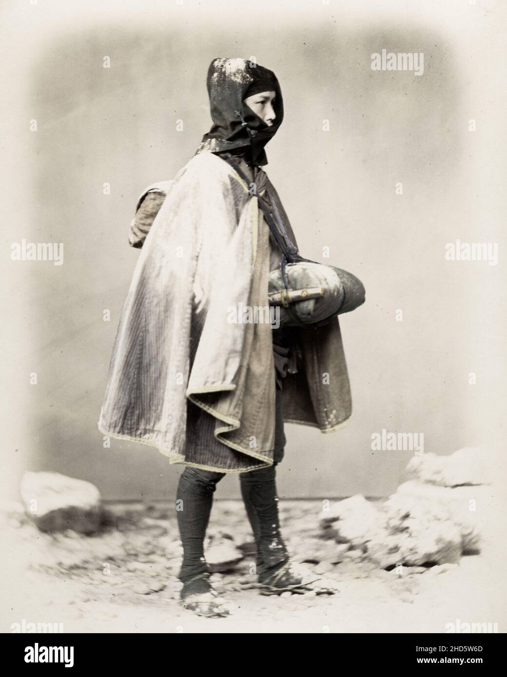 Vintage 19th century photograph: Japanese man in winter clothes ...