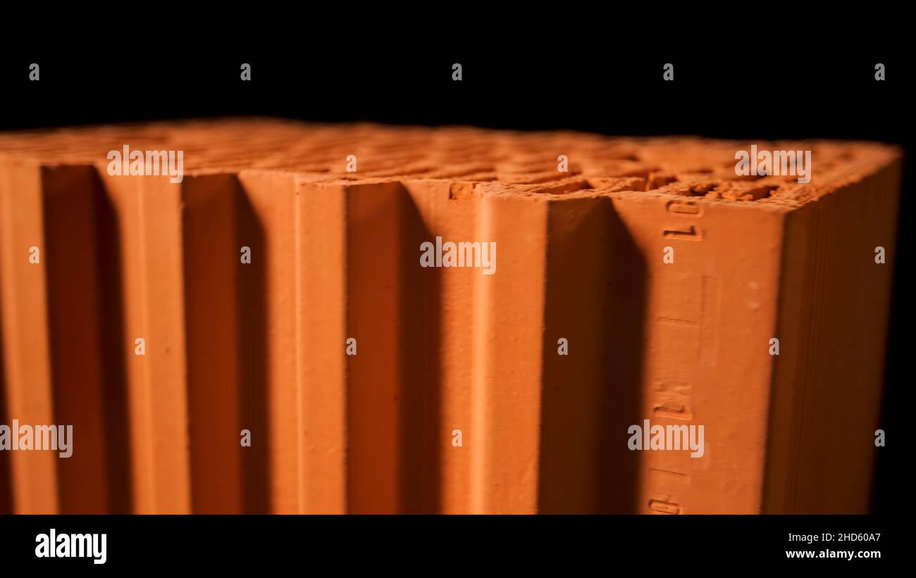 Close up of perforated ceramic blocks with round holes isolated on ...