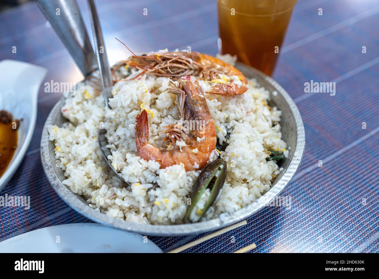 Filipino style Seafood fried rice at Restaurant Stock Photo - Alamy