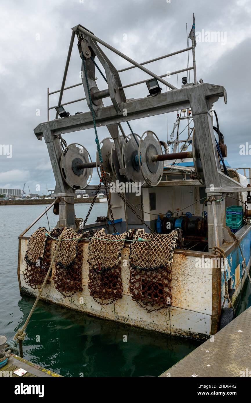 A trawler with dredge nets specialized in scallops is seen from the ...