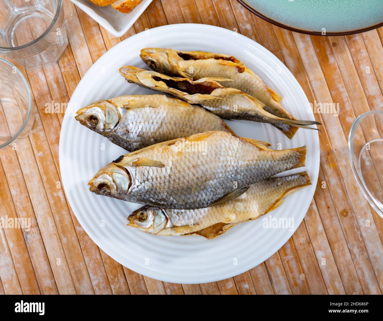 Air-dried salted gutted fish roach Stock Photo - Alamy