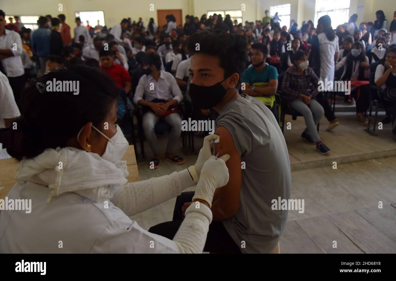Guwahati, Guwahati, India. 3rd Jan, 2022. Teenagers receving 1st dose ...