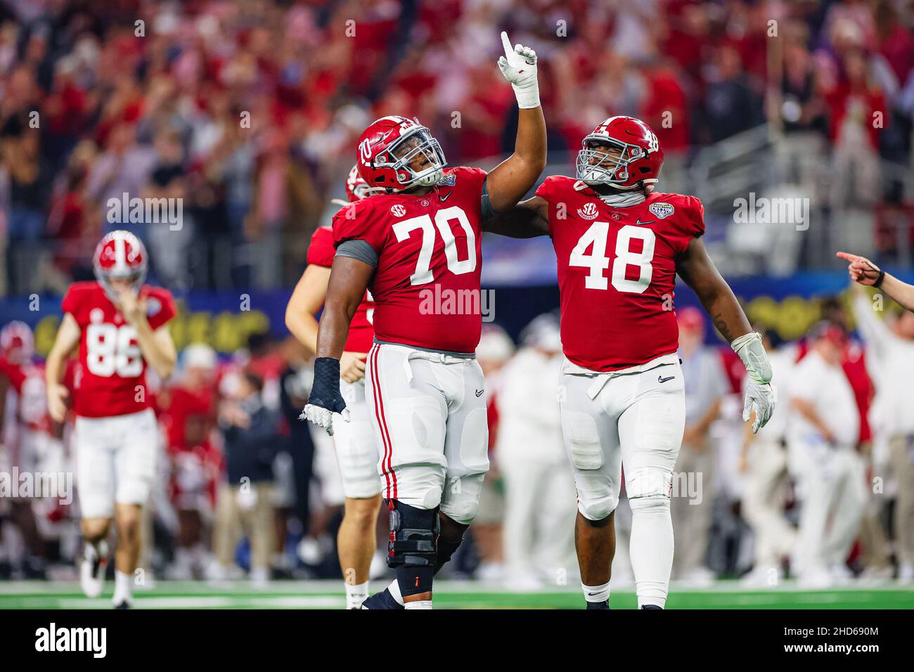 Alabama Crimson Tide guard Javion Cohen (70) and defensive end ...