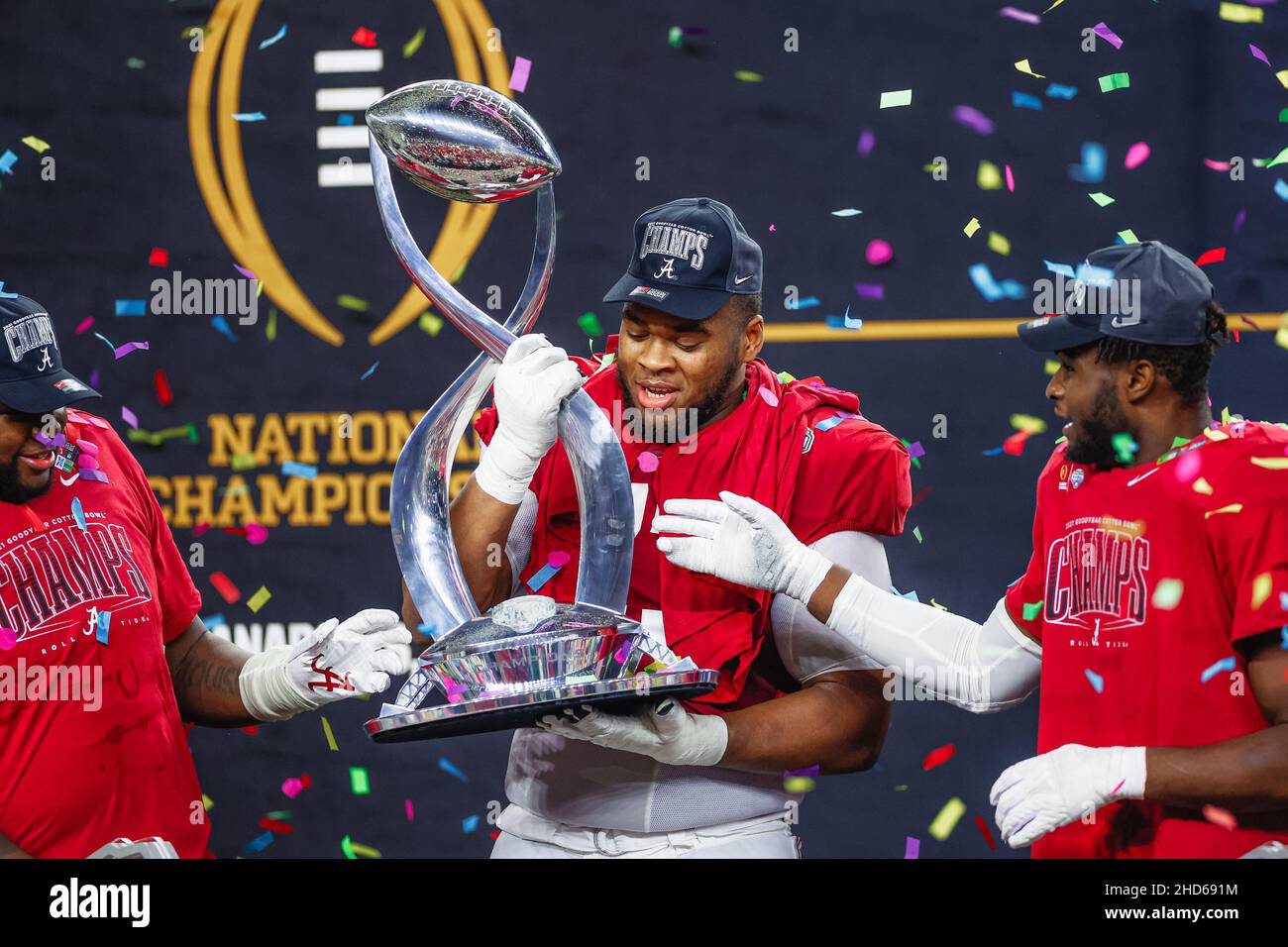 Alabama Crimson Tide players celebrate a win with the Cotton Bowl ...