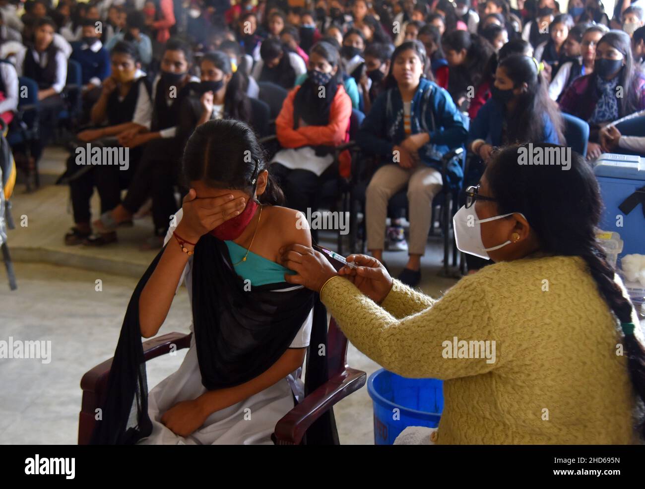 Guwahati, Guwahati, India. 3rd Jan, 2022. Teenagers receving 1st dose ...