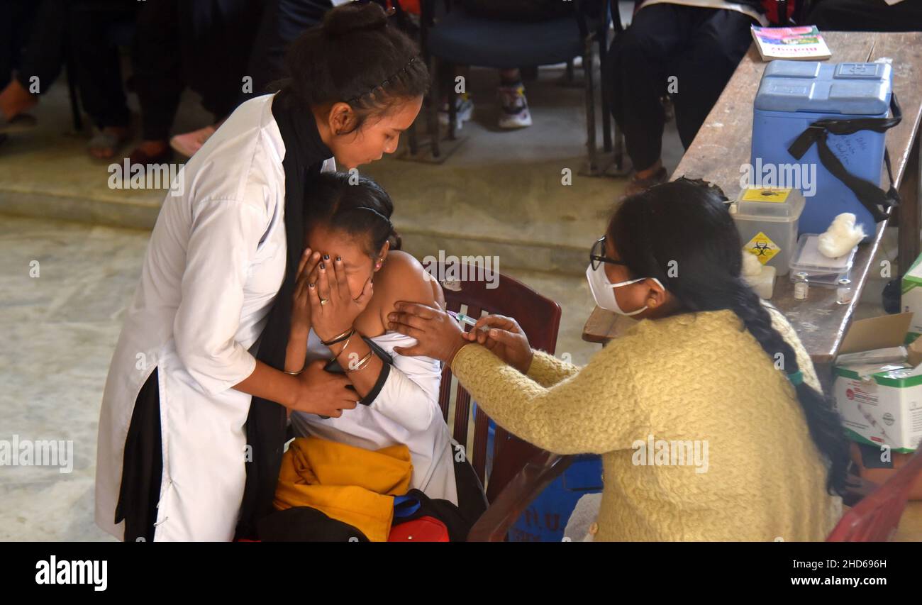 Guwahati, Guwahati, India. 3rd Jan, 2022. A nurse inject 1st dose of ...