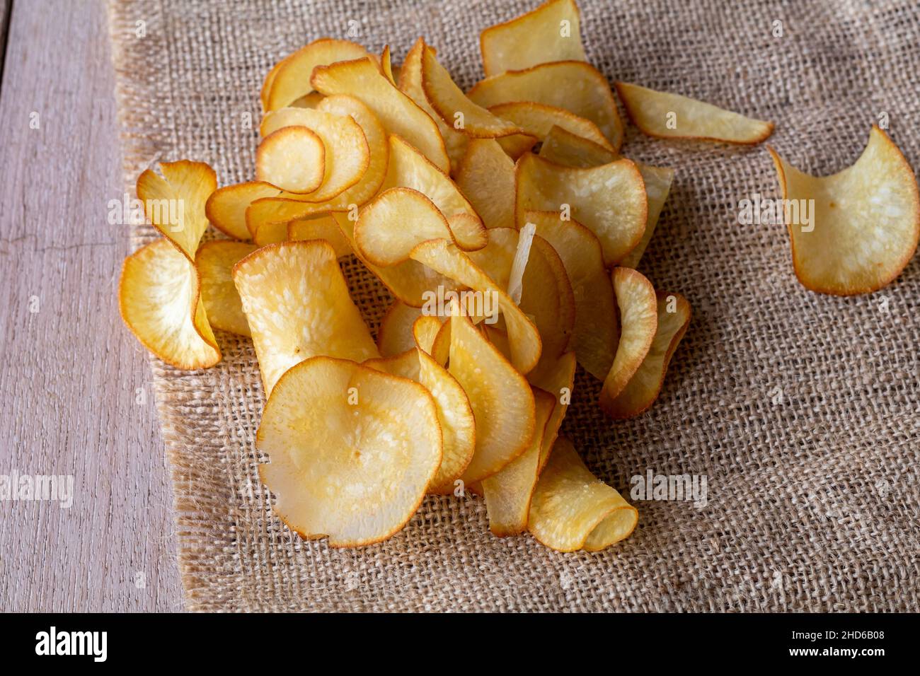 Savory salted cassava chips, a traditional Indonesian snack Stock Photo ...