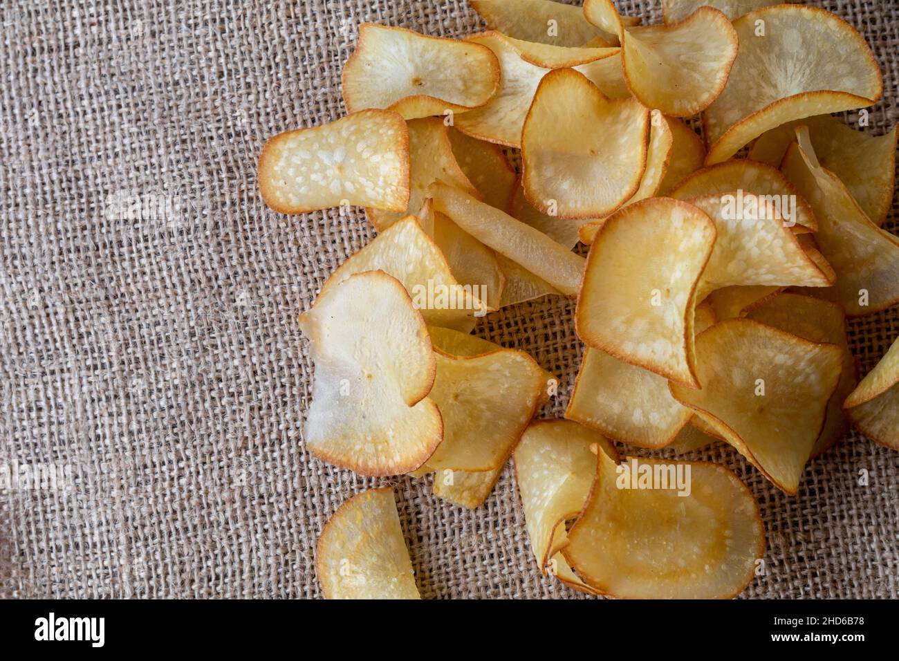 Savory salted cassava chips, a traditional Indonesian snack Stock Photo ...