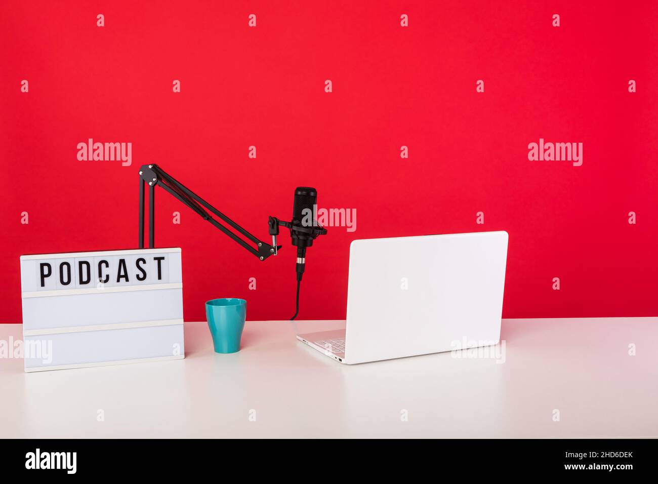 Podcast radio recording studio, with computer, microphone and light box ...
