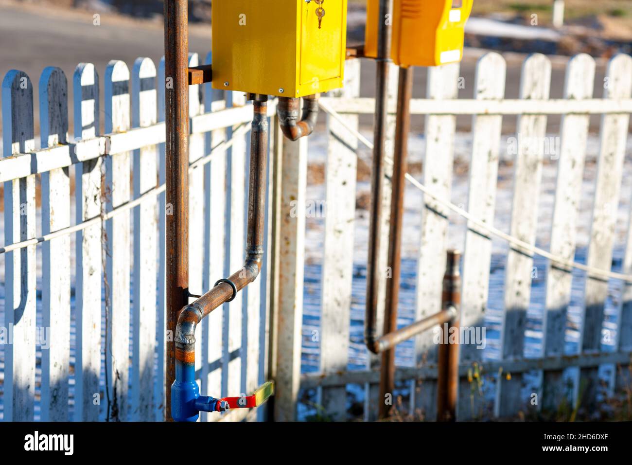 closed lpg pipeline and yellow meter box, winter scene Stock Photo - Alamy