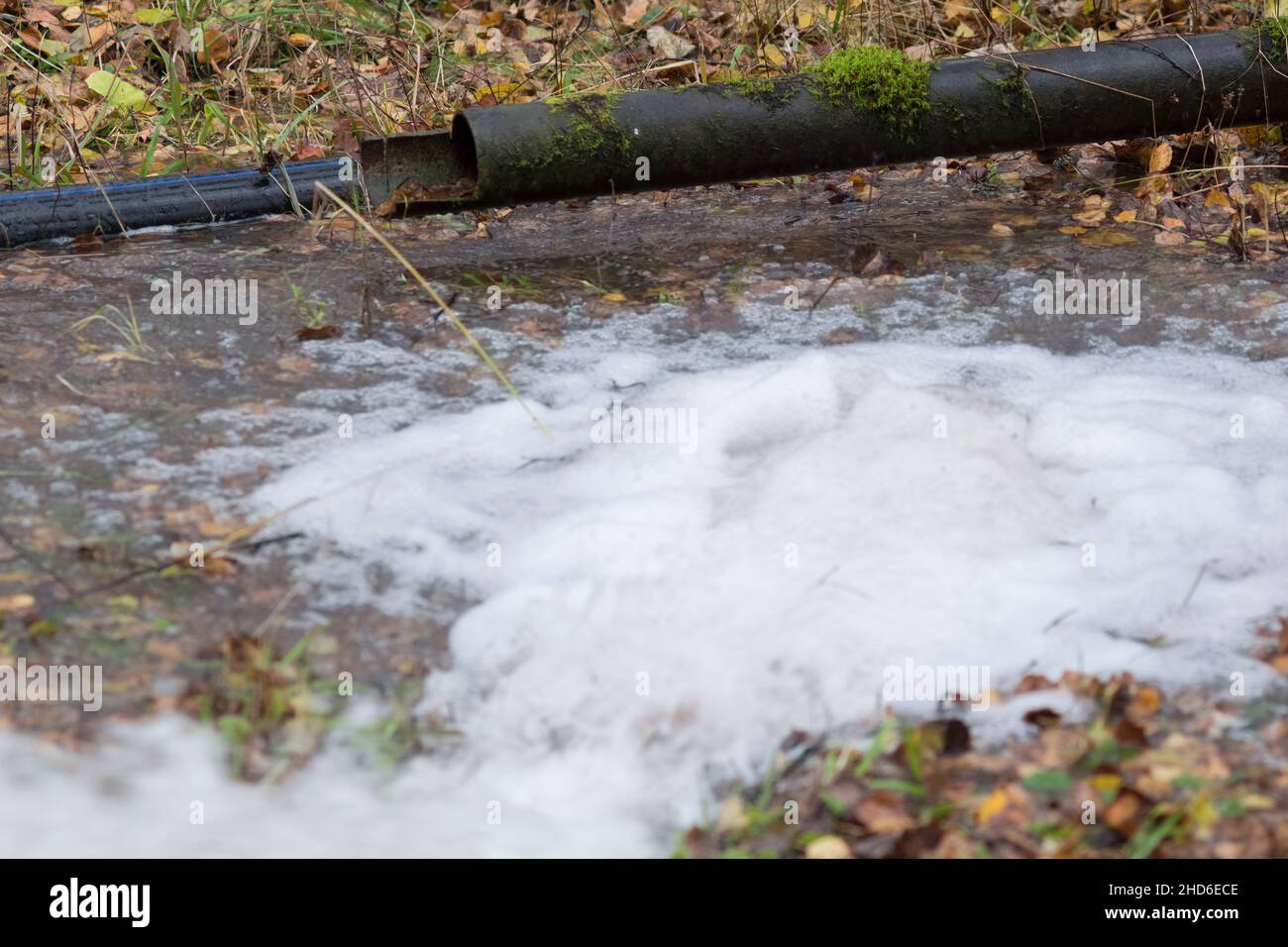 A water pipe burst and flood on the ground, outdoor shot Stock Photo ...