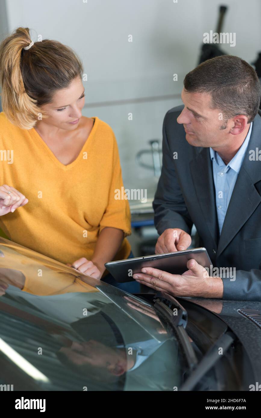 Professional salesperson selling cars hi-res stock photography and ...