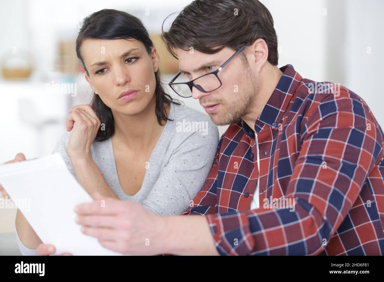 family couple with serious faces Stock Photo - Alamy