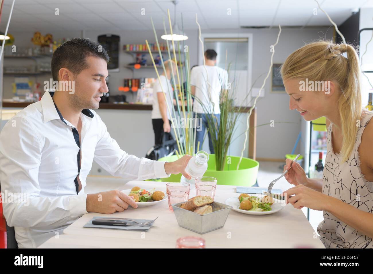 couple having nice conversation during lunch Stock Photo - Alamy