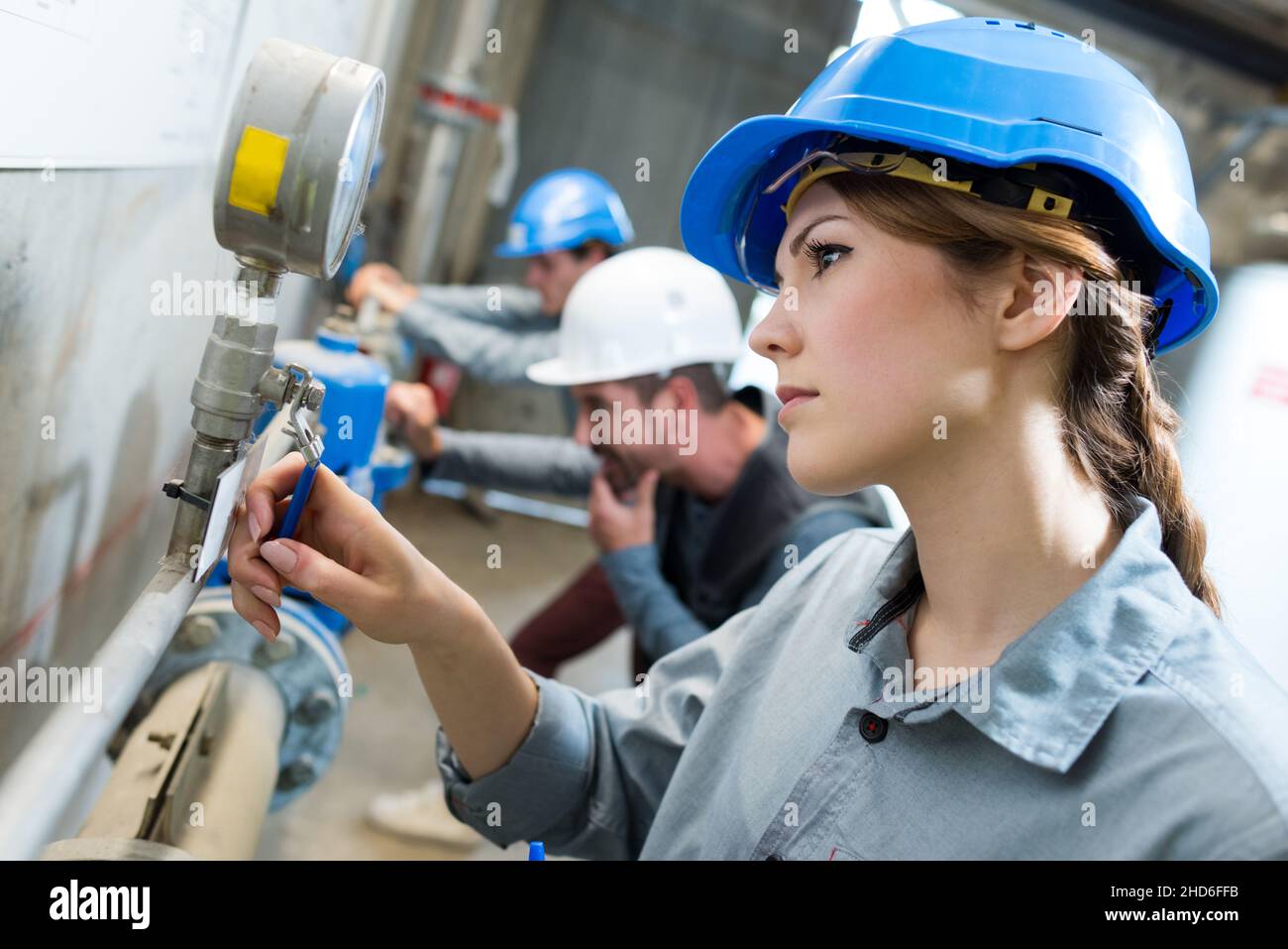 female engineer working in temperature control room Stock Photo - Alamy